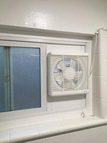 13 Best Window Fans For Keeping Things Nice And Breezy