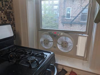 13 Best Window Fans For Keeping Things Nice And Breezy
