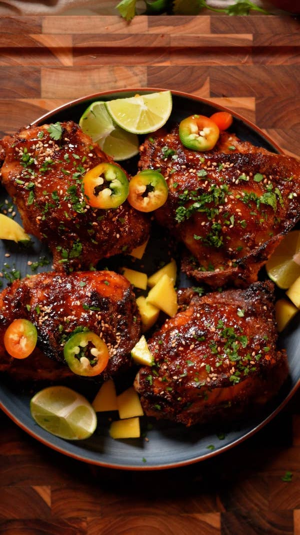 Sticky Tamarind Mango Chicken Thighs | Tasty